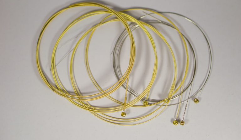 7 Things to Do With Old Guitar Strings (Don't Toss Them!) - Cool Gross Weird