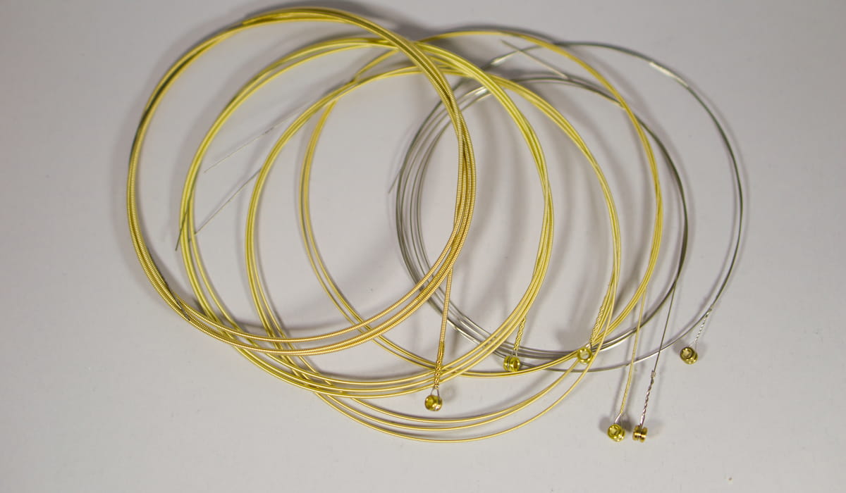 7 Things to Do With Old Guitar Strings (Don't Toss Them!) - Cool Gross ...